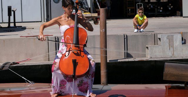 Violin boat the canals of Venice | gooyadaily